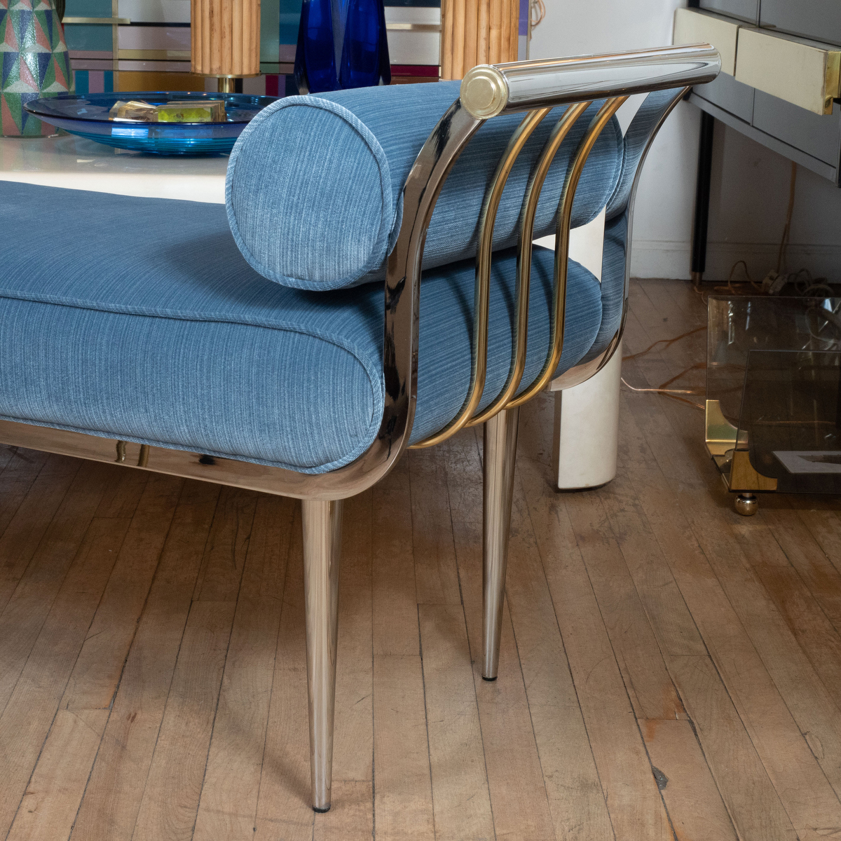 Curvilinear nickel upholstered bench | Benches | John Salibello